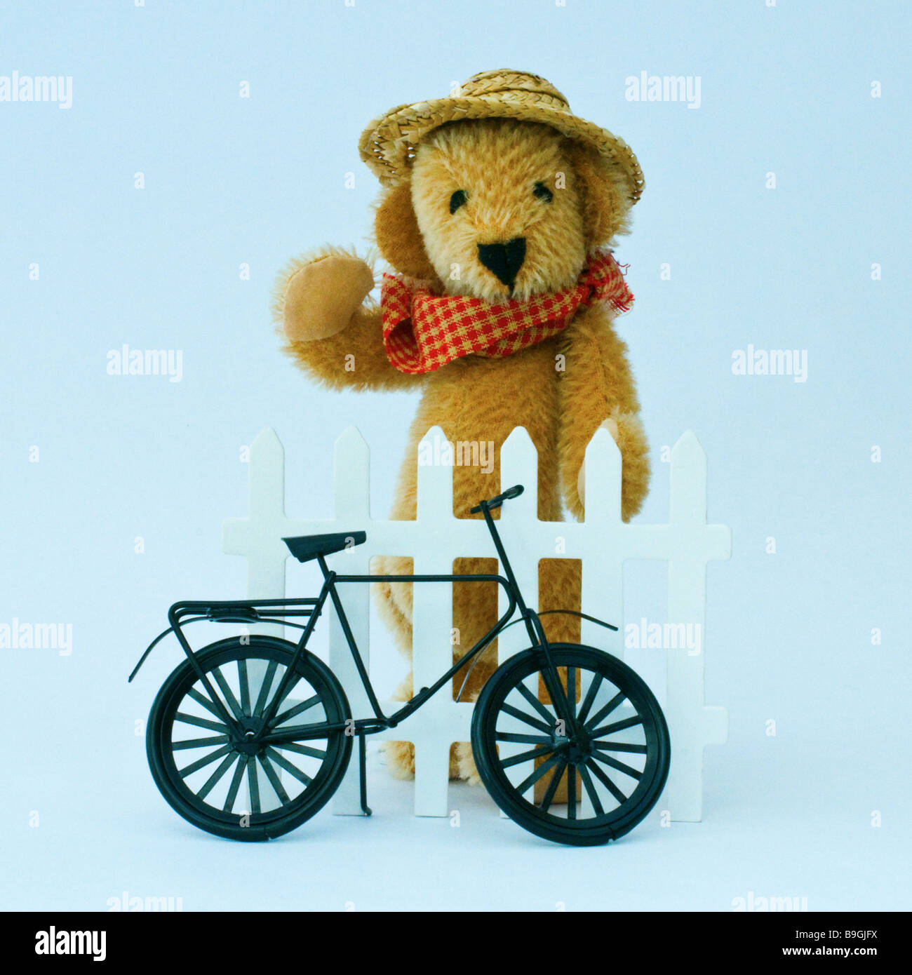 Miniature teddy bear at the fence (Mini Bear Collection Stock Photo - Alamy