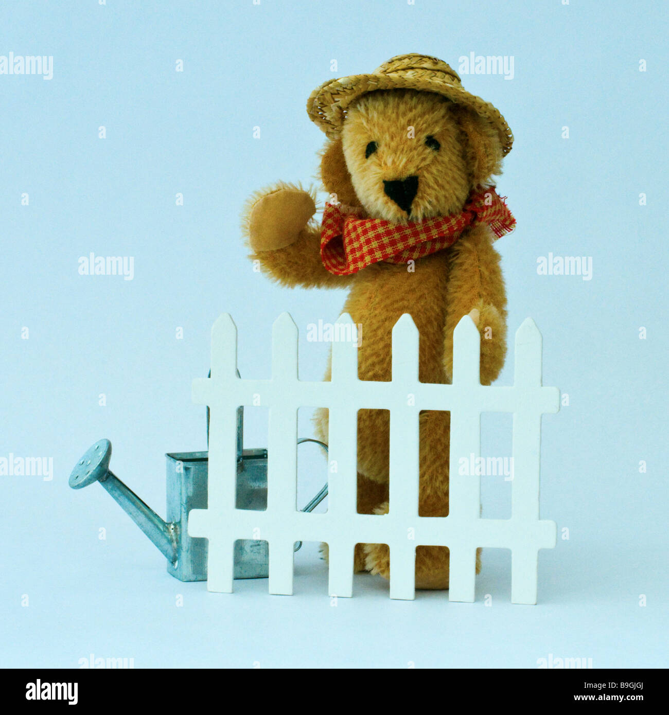 Miniature teddy bear at the fence (Mini Bear Collection Stock Photo - Alamy