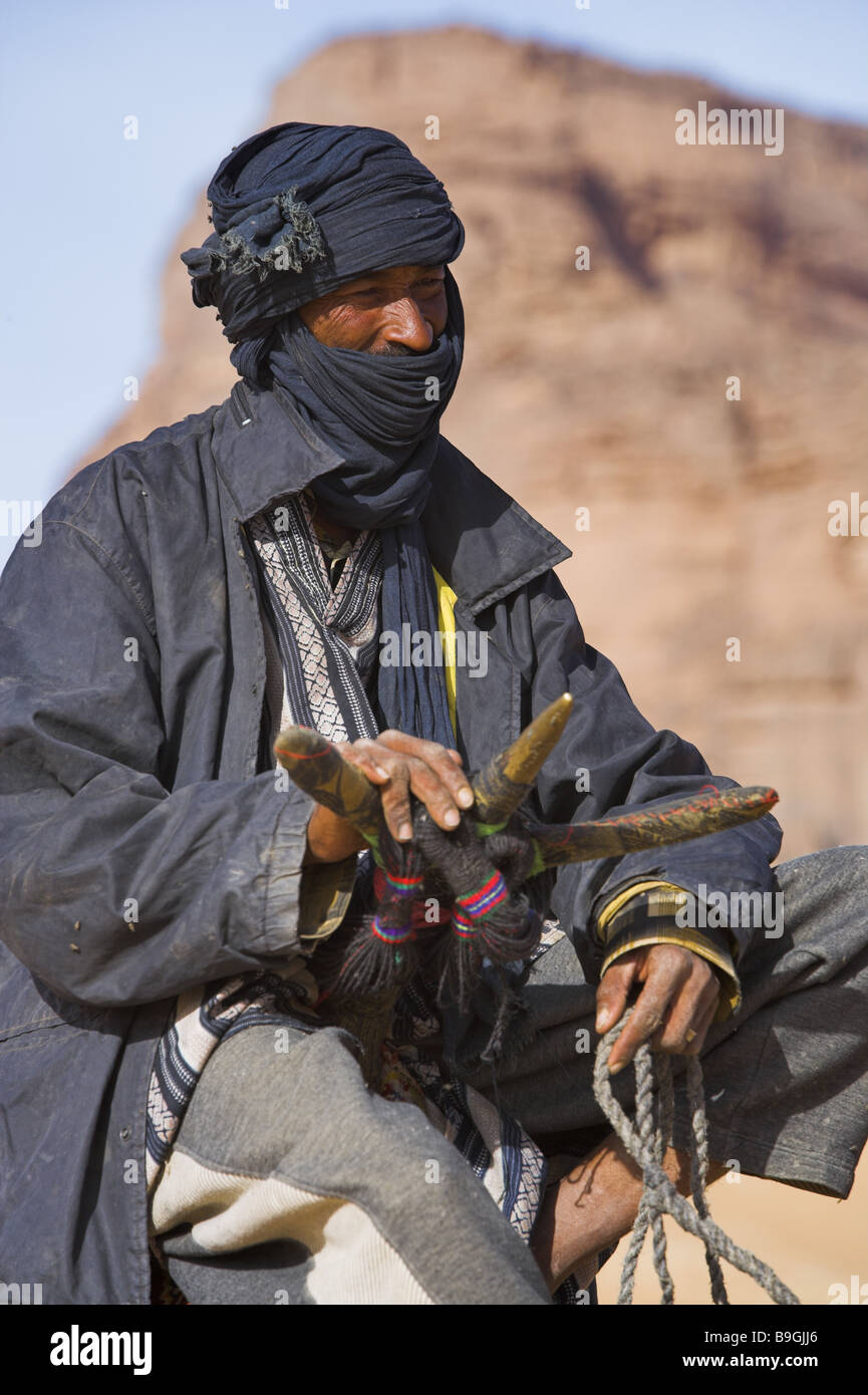 Africa Libya Jabal Akakus Tuareg rding a camel portrait Africa Akakus ...