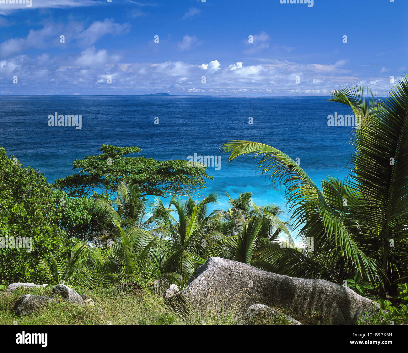 Seychelles island rocks trees gaze lake horizon clouded sky island ...