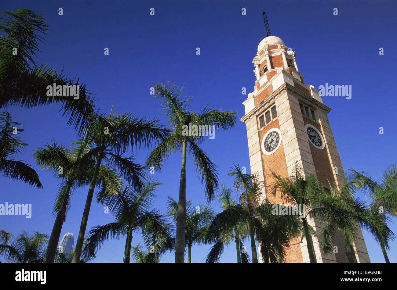 China Hong Kong Kowloon Tsim Sha Tsui railway station Clock tower palms ...