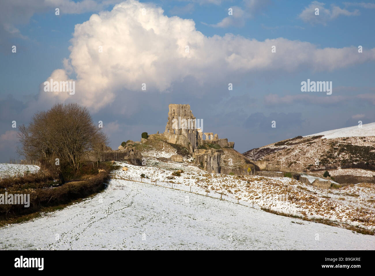 A rare fall of snow covers the Dorset landscape around the ruins of ...