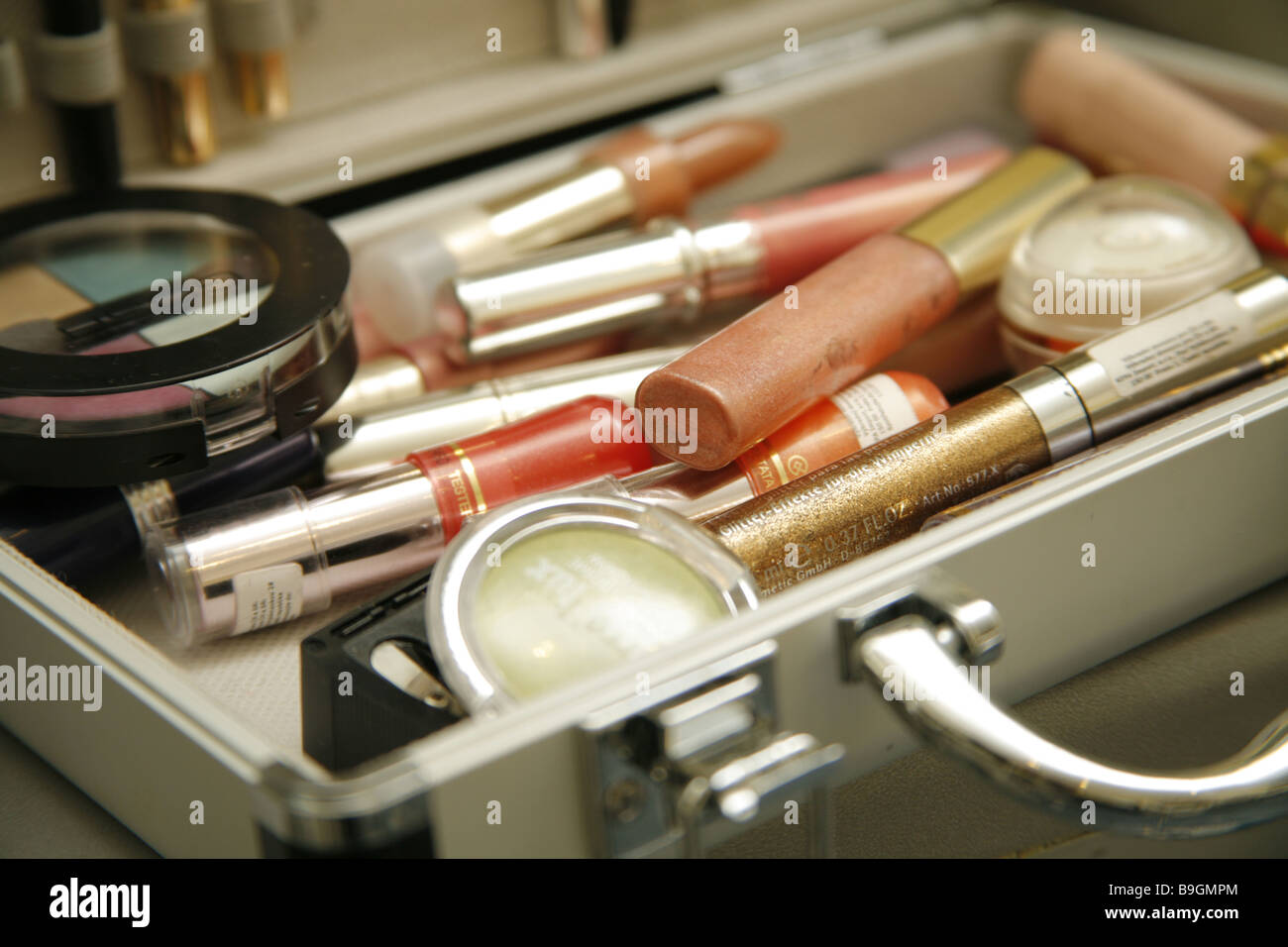 Suitcase with make up kit Stock Photo - Alamy