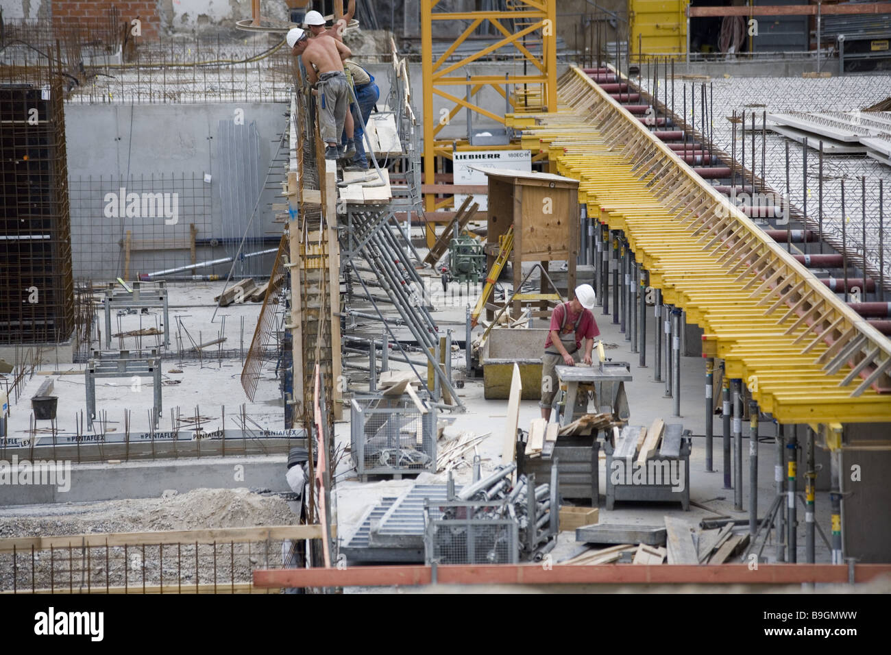 Building site workers Stock Photo - Alamy