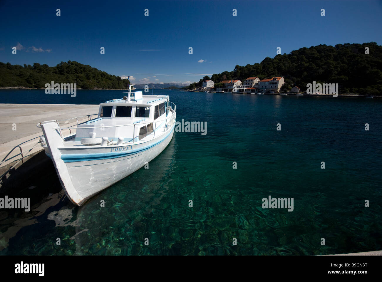 A boat rests in Pomena's port on the island Mljet, Croatia Stock Photo ...