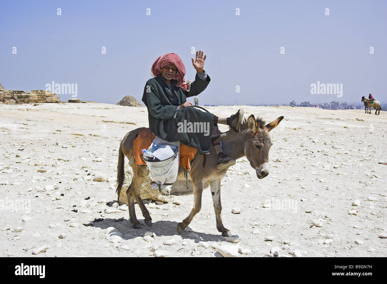 Donkeys with riders hi-res stock photography and images - Alamy