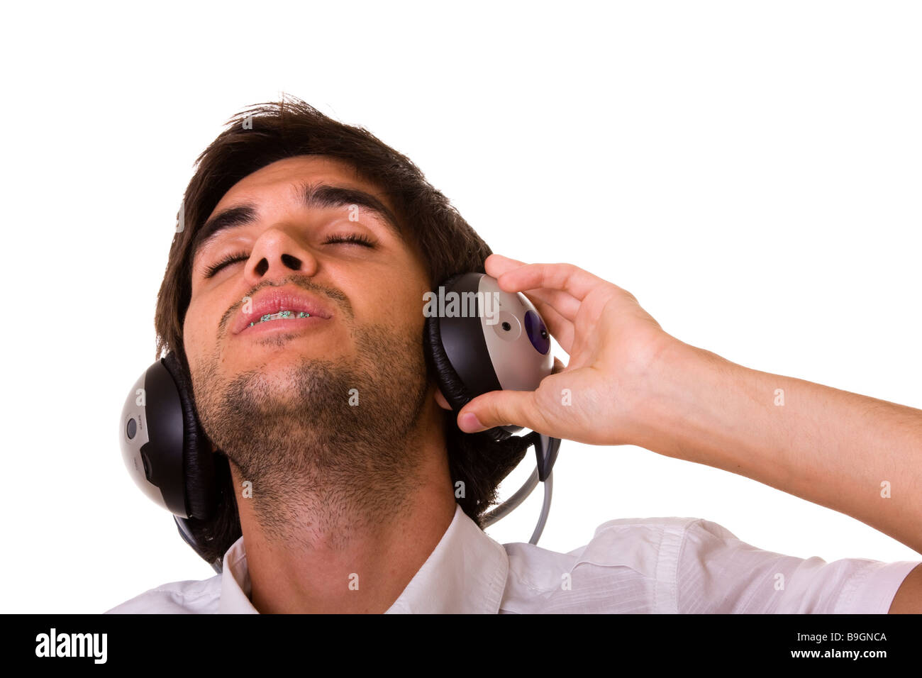 young men feeling the music isolated on white Stock Photo - Alamy