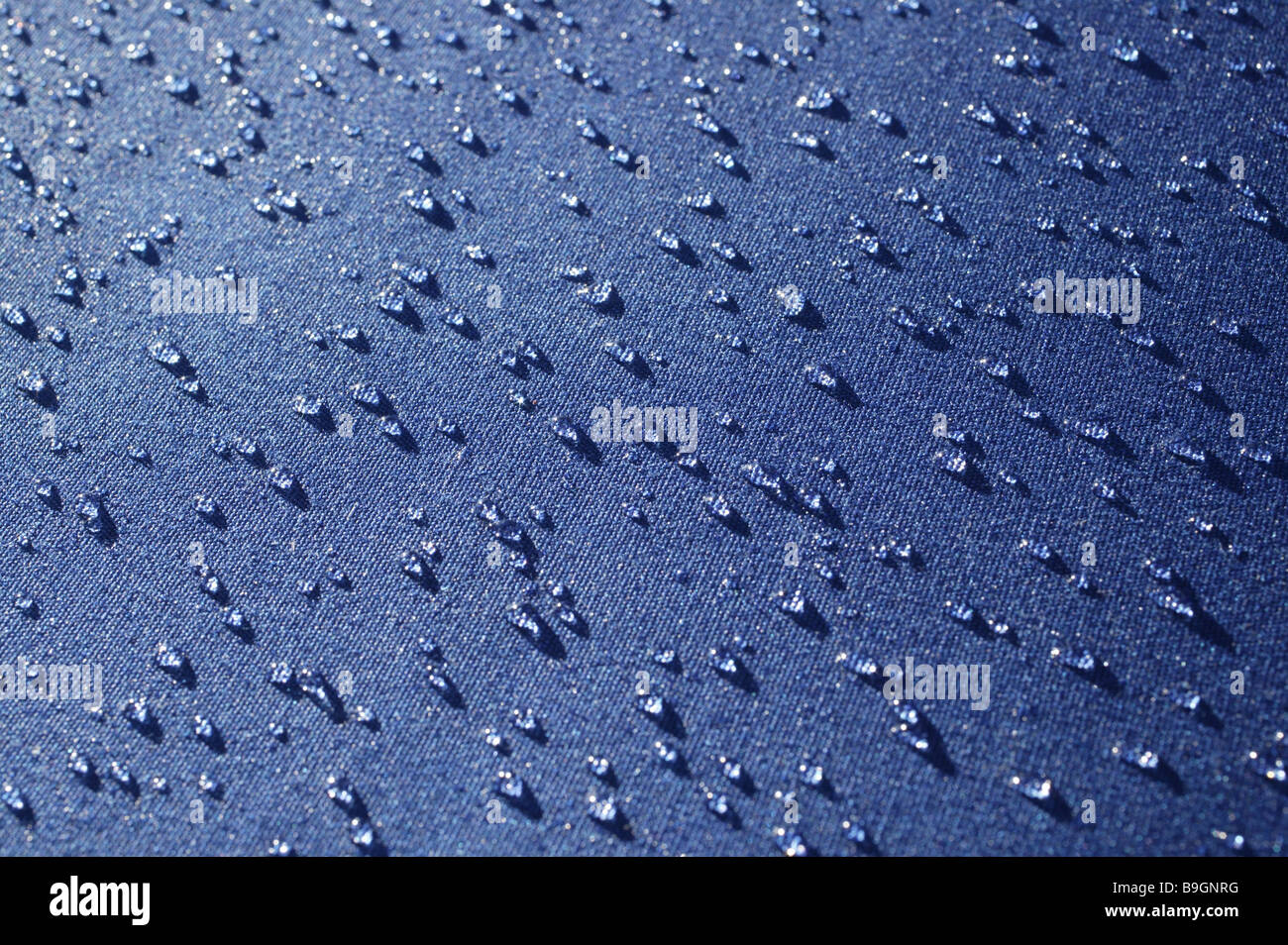 Raindrops material blue close-up Stock Photo - Alamy