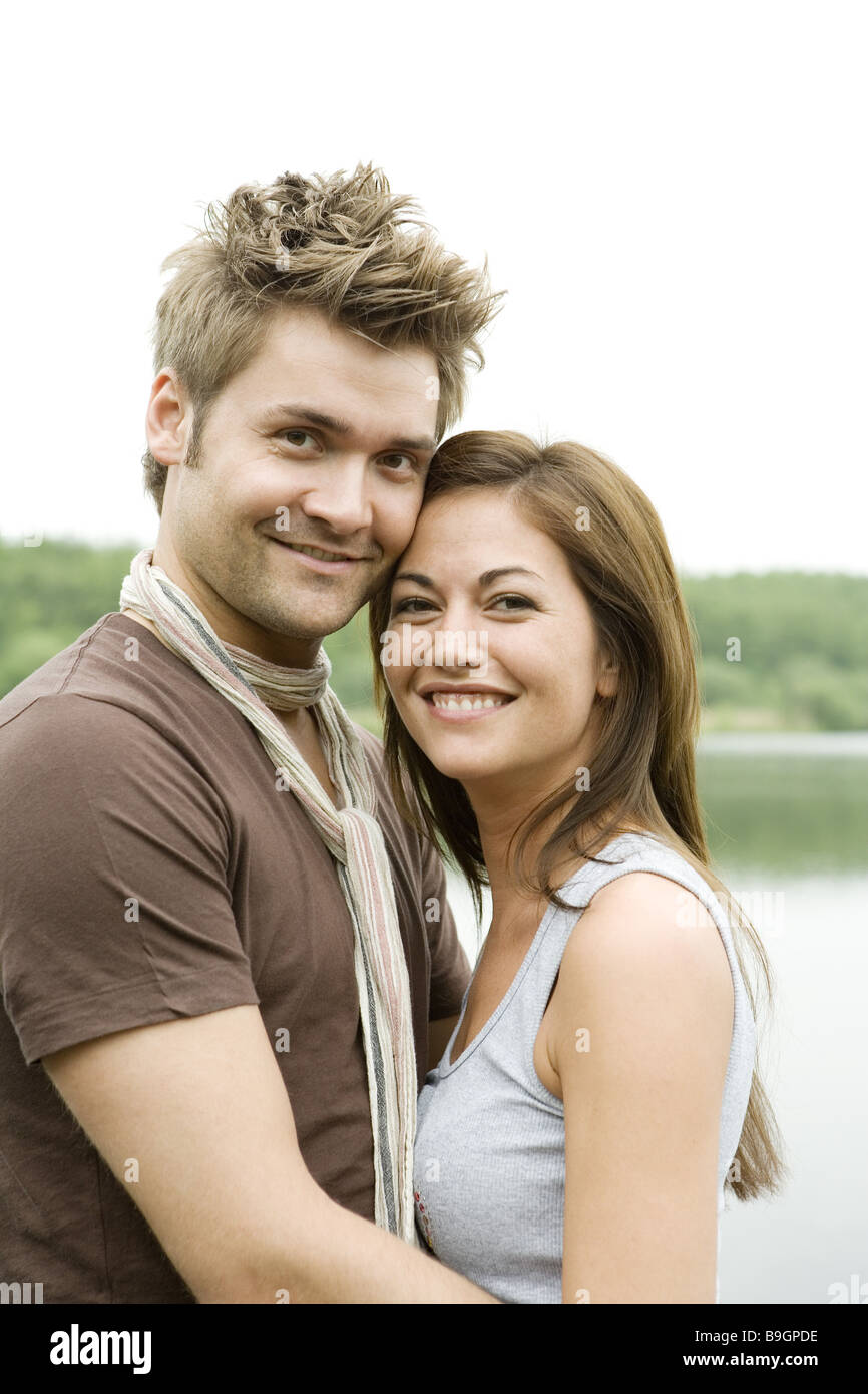 Shore couple embrace fallen in love semi-portrait Stock Photo - Alamy