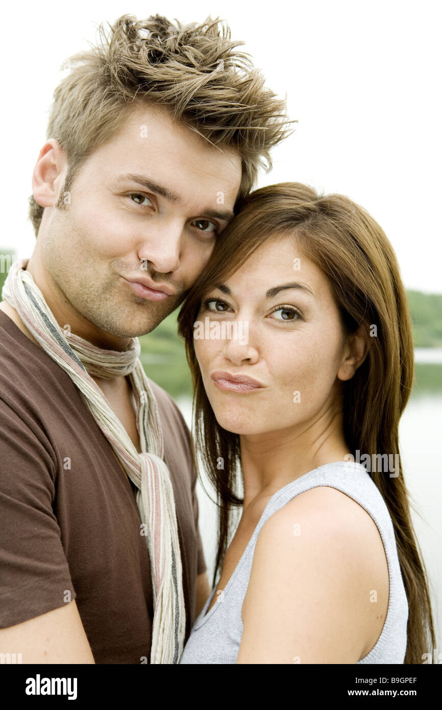Shore couple embrace fallen in love semi-portrait Stock Photo - Alamy