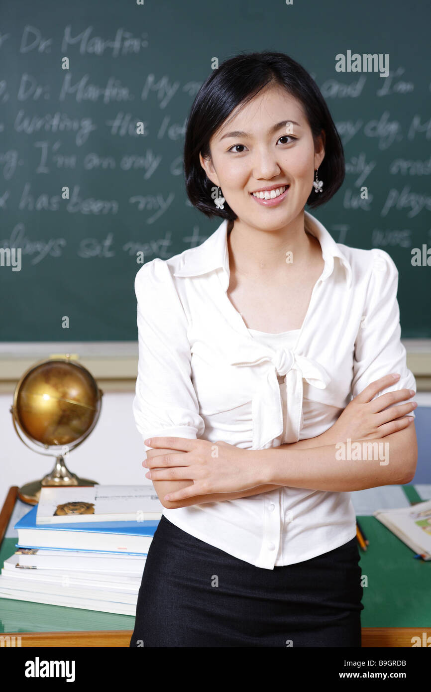 Miss Teacher in School Stock Photo - Alamy