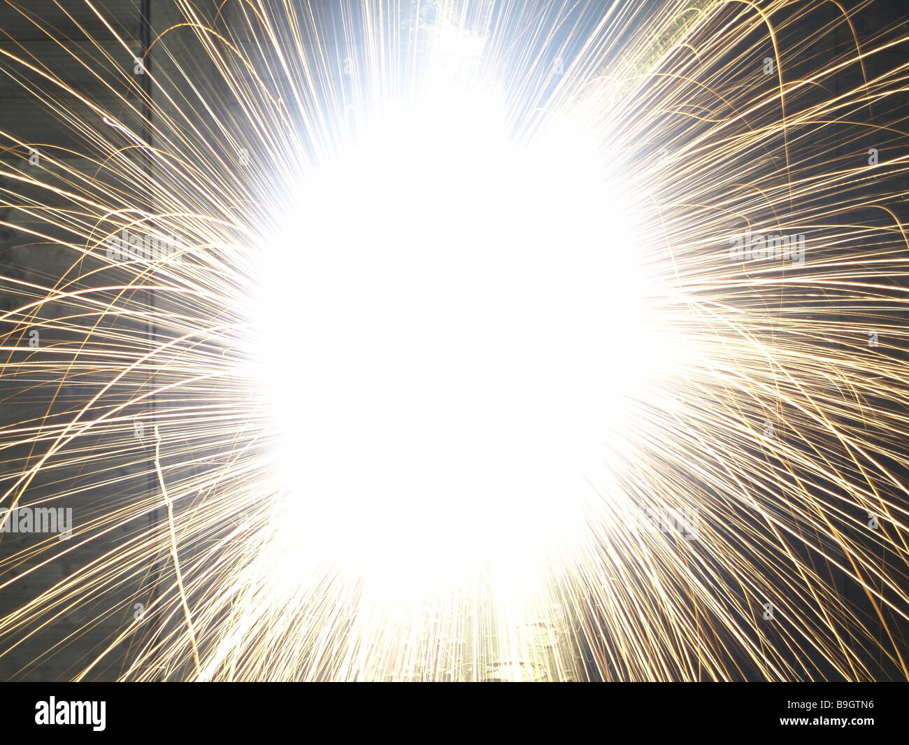 Wheel of Fire, Catherine wheel spinning at night time Stock Photo - Alamy