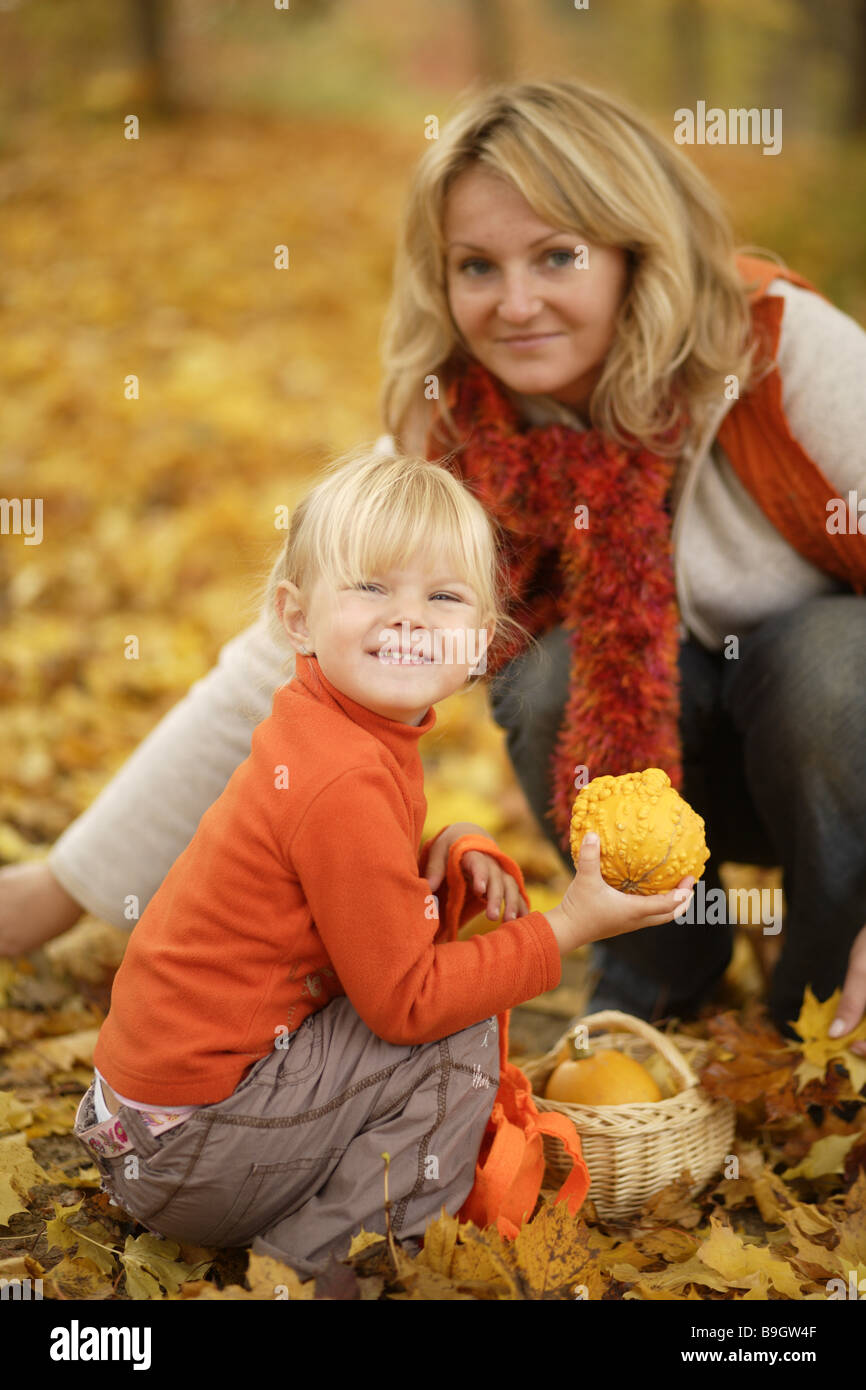 Collect forest mother daughter fall foliage Stock Photo - Alamy