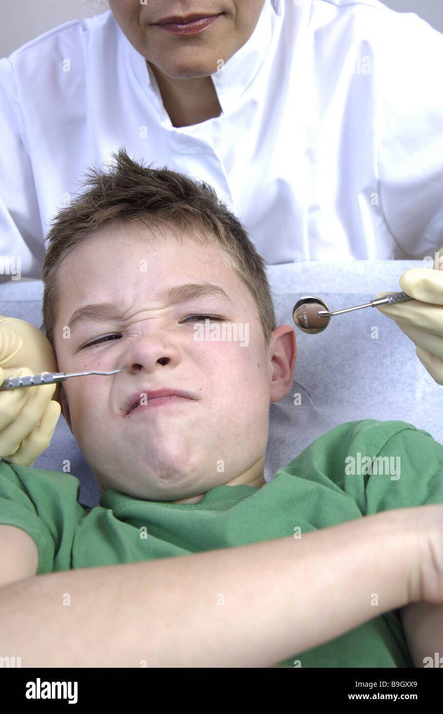 Dentist boy mouth pinching hard anxiously detail series people doctor ...