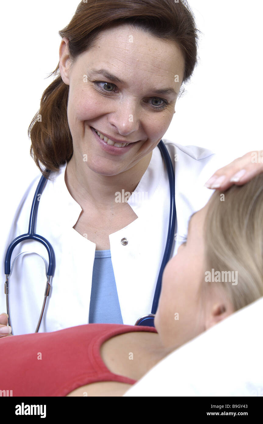 Pediatrician girl hand forehead puts on feeling examination series ...