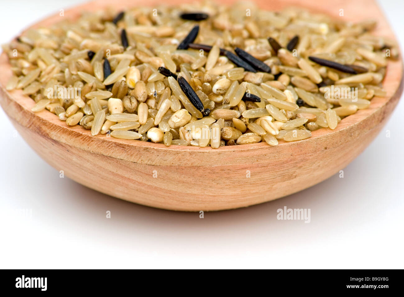 Wild rice on white background Stock Photo - Alamy