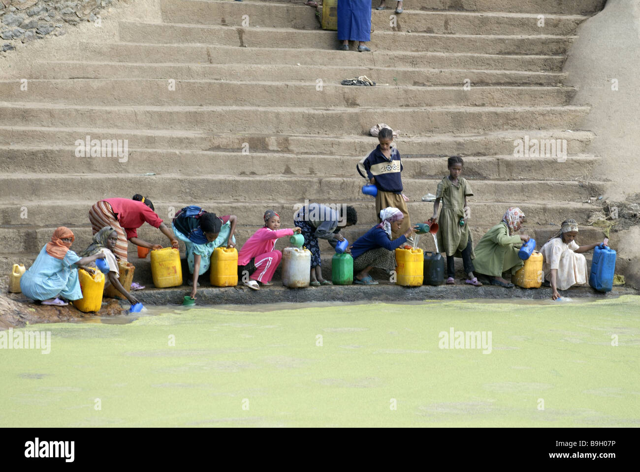 Ethiopia Axum basins people fills canisters water Africa East-Africa ...