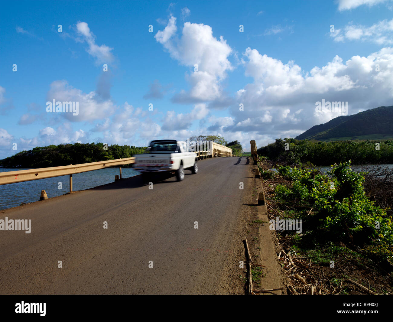 Pick up Truck Driving over Causeway Mangroves at Anse Colas to Pointe ...