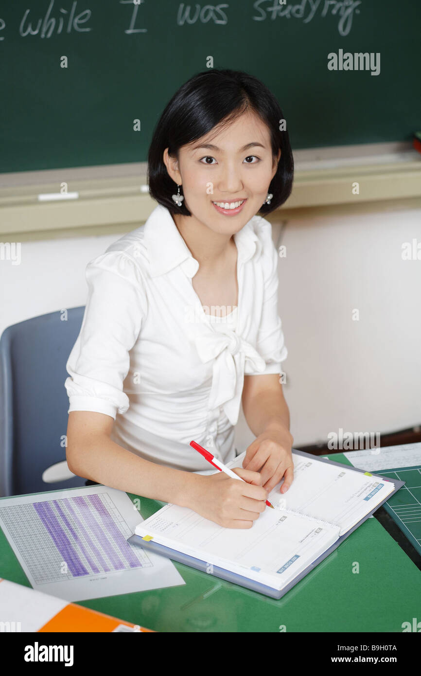 Miss Teacher in School Stock Photo - Alamy