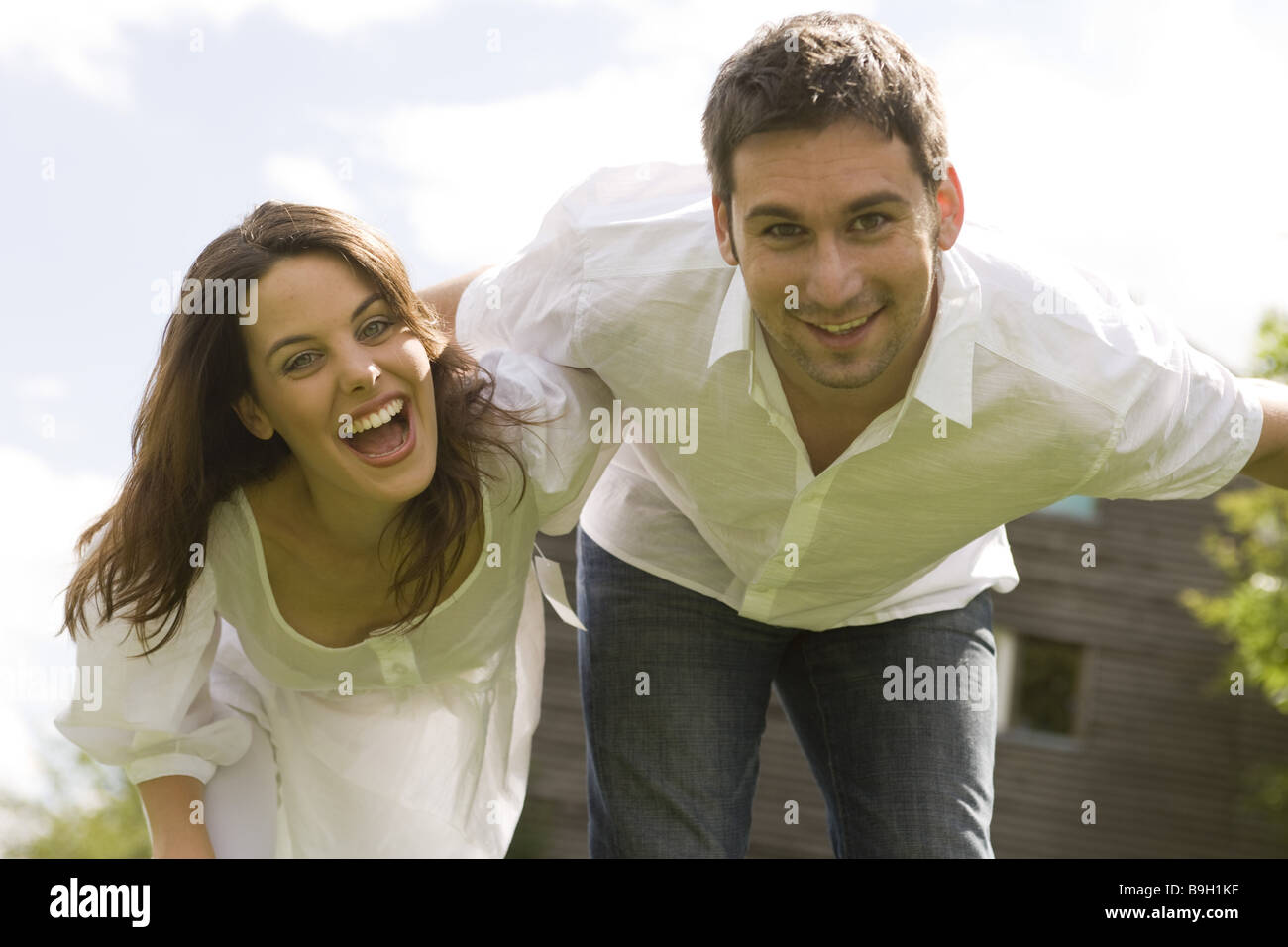 Mate laughing embraces fun nature outside semi-portrait 20-30 years 30 ...