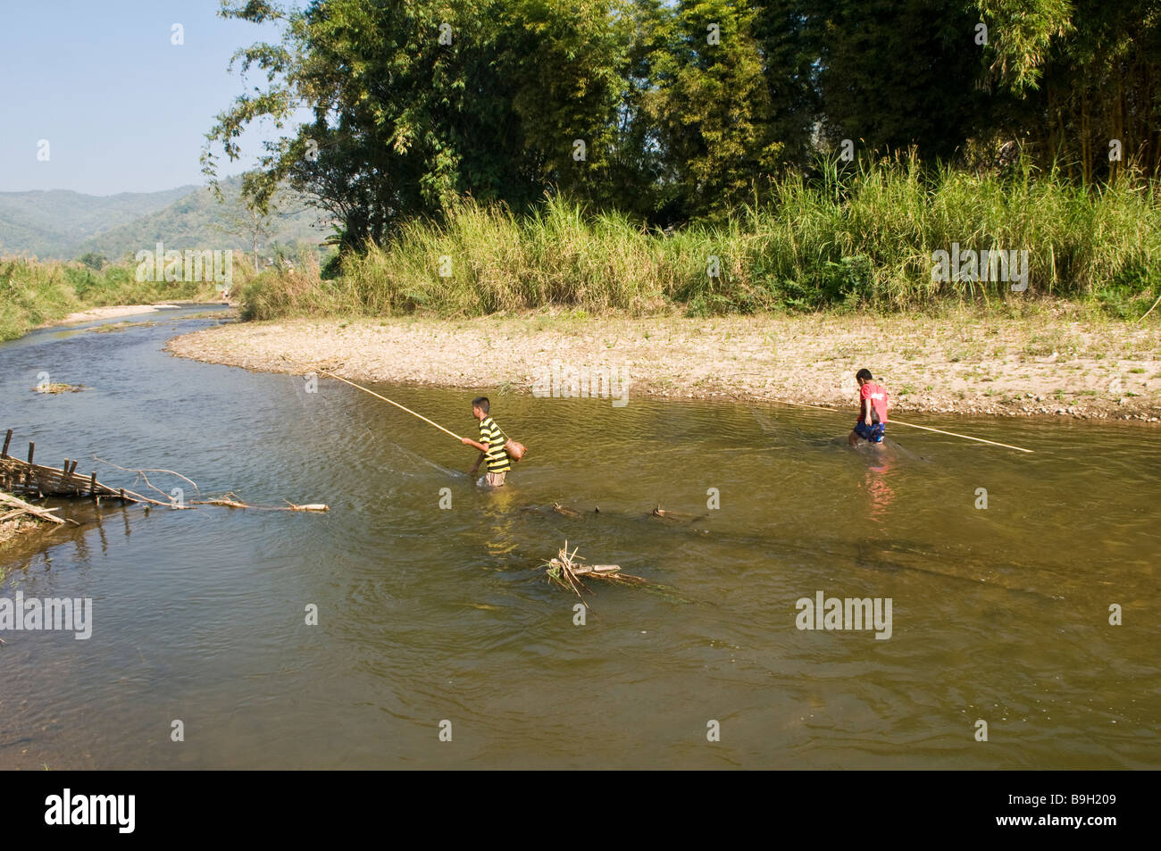 Children fishing the Chiang Rai region of North Thailand Stock Photo ...