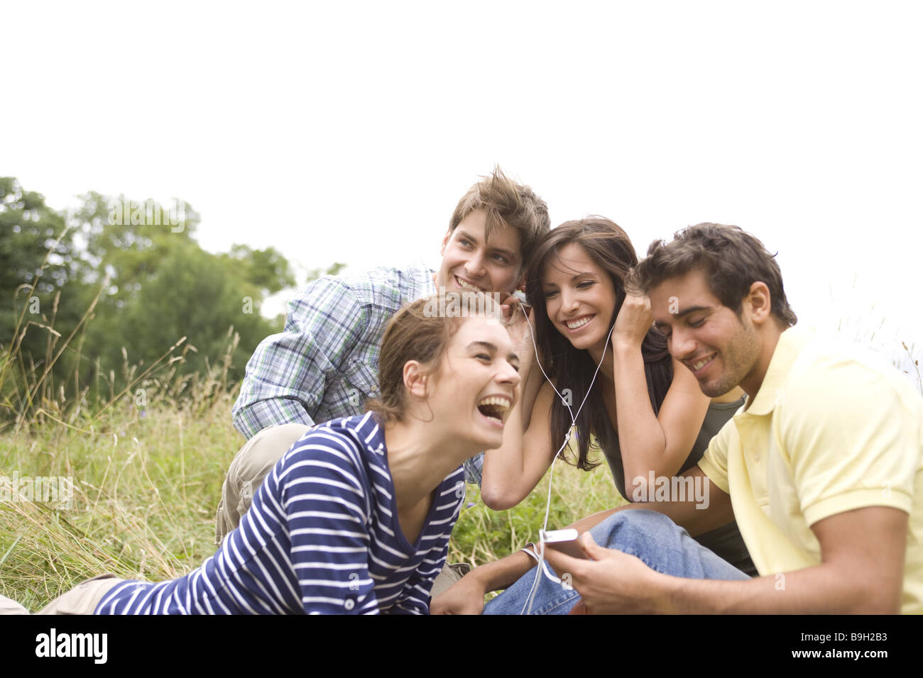 Group leisure time activity Mp3 music hears nature outside 20-30 years ...