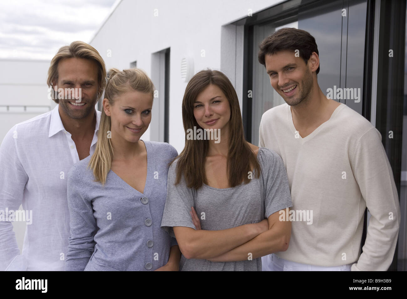 Group smiling side by side semi-portrait balcony outside 20-30 years 30 ...