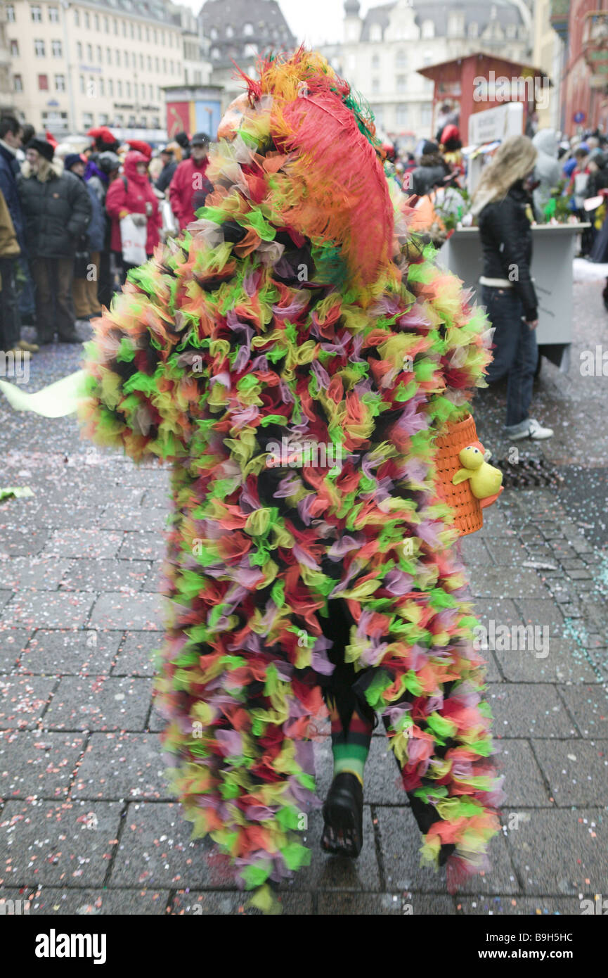 Switzerland Basel Shrove Tuesday person back view dresses up passers-by ...