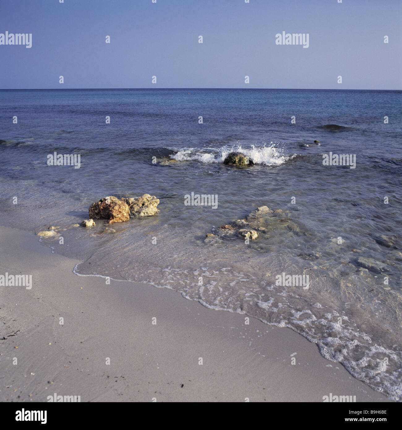 Sandy beach rocks sea view beach beach sand stones lake water shallow ...