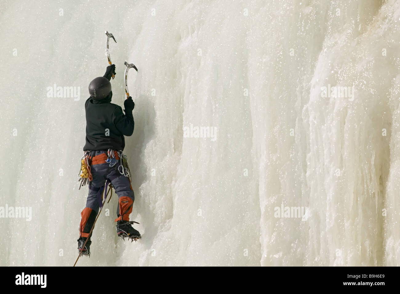 Ice-climber back view no models release series waterfall froze ice ice ...
