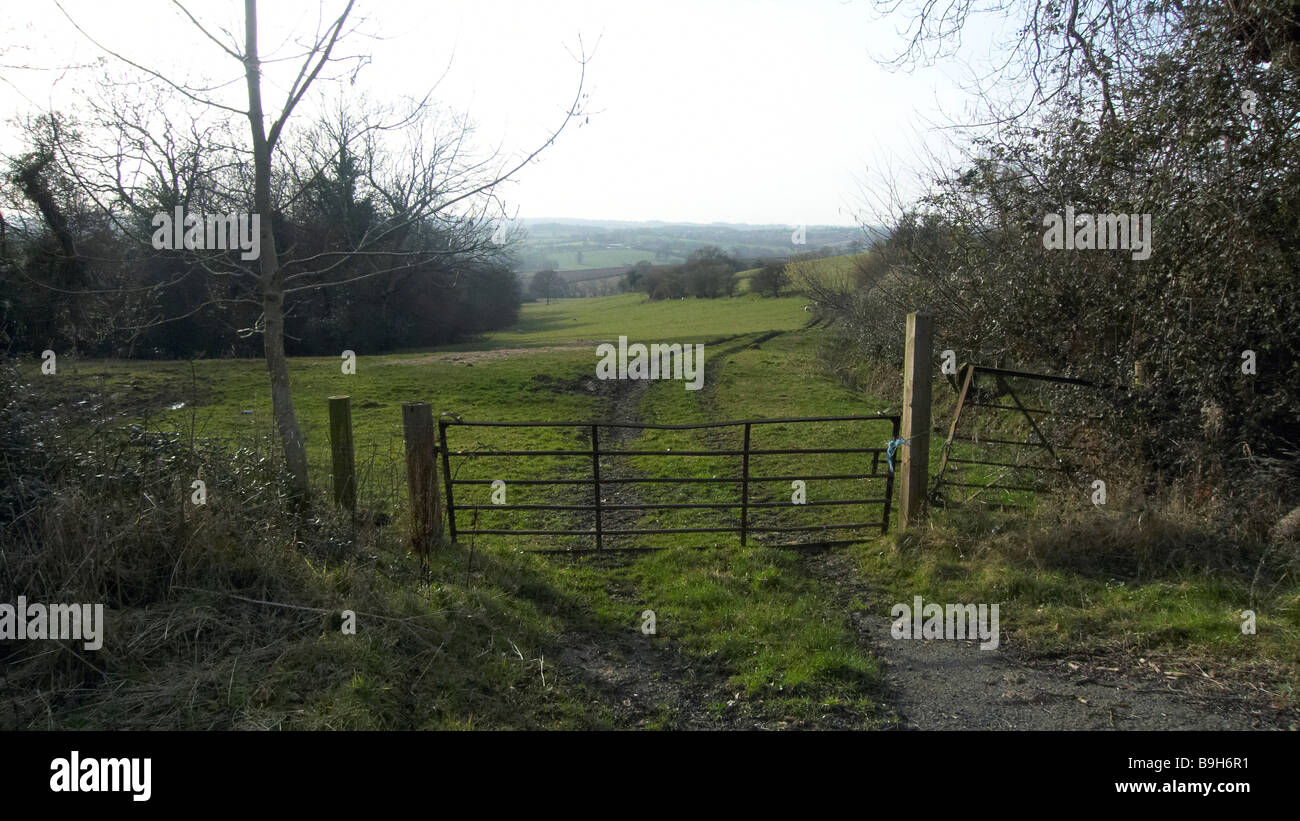 gate and fields in the country Stock Photo - Alamy