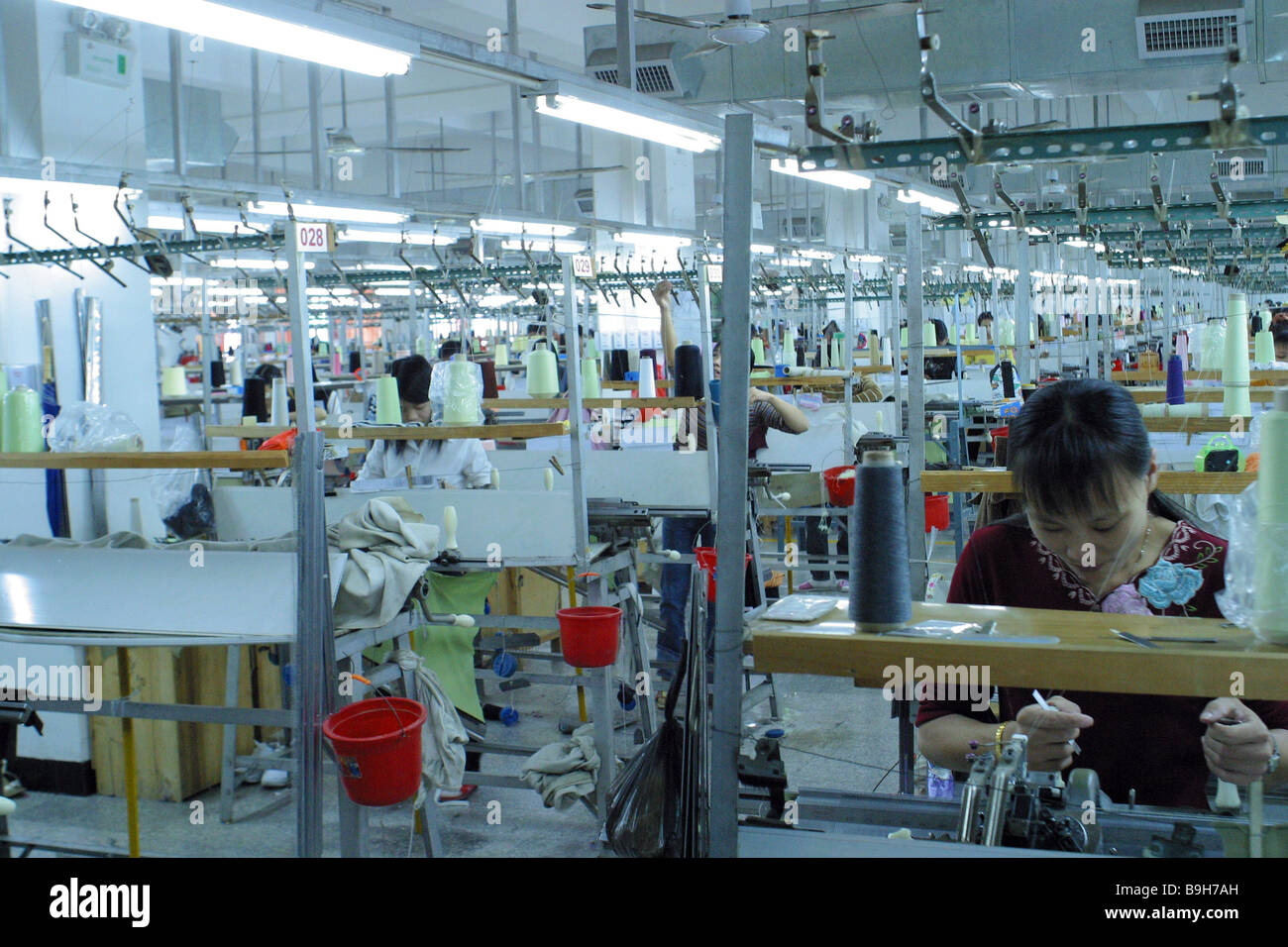 Factory industry workers machines Stock Photo - Alamy