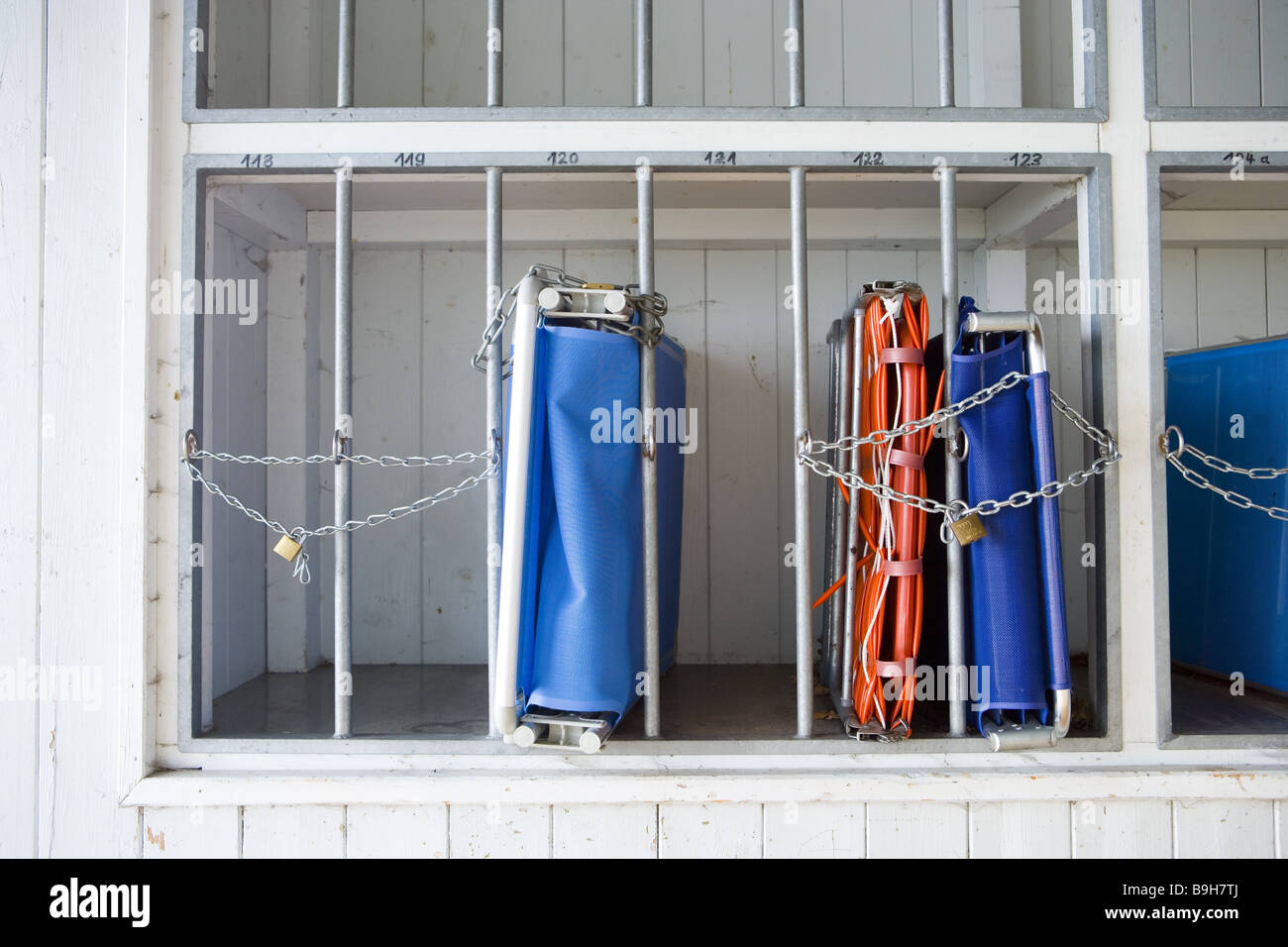 Deck chairs distribution collapsed Stock Photo - Alamy
