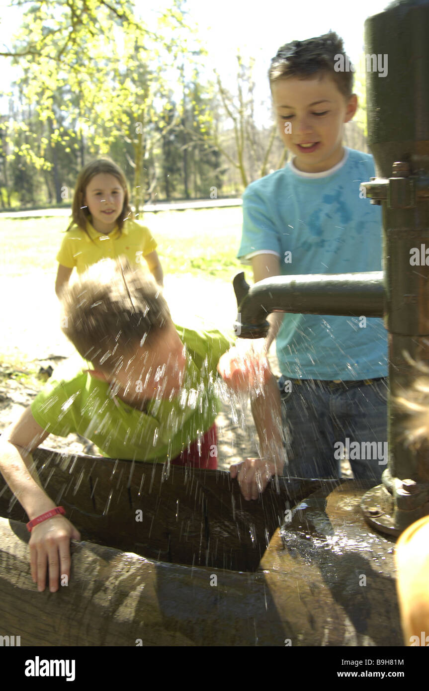Children wells fun Stock Photo - Alamy
