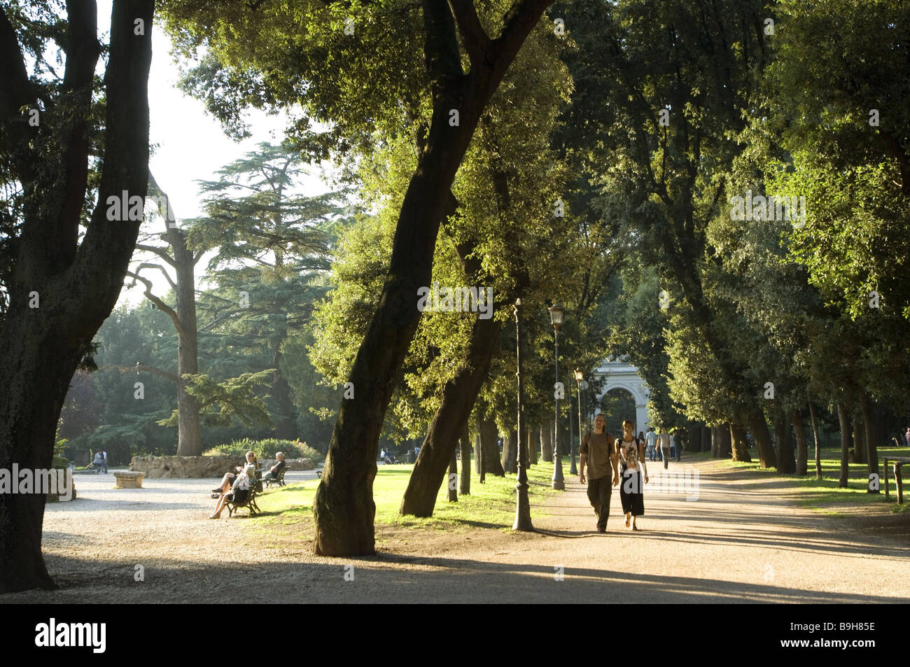 Italy Rome villa Borghese park persons out for a walk outside trees ...