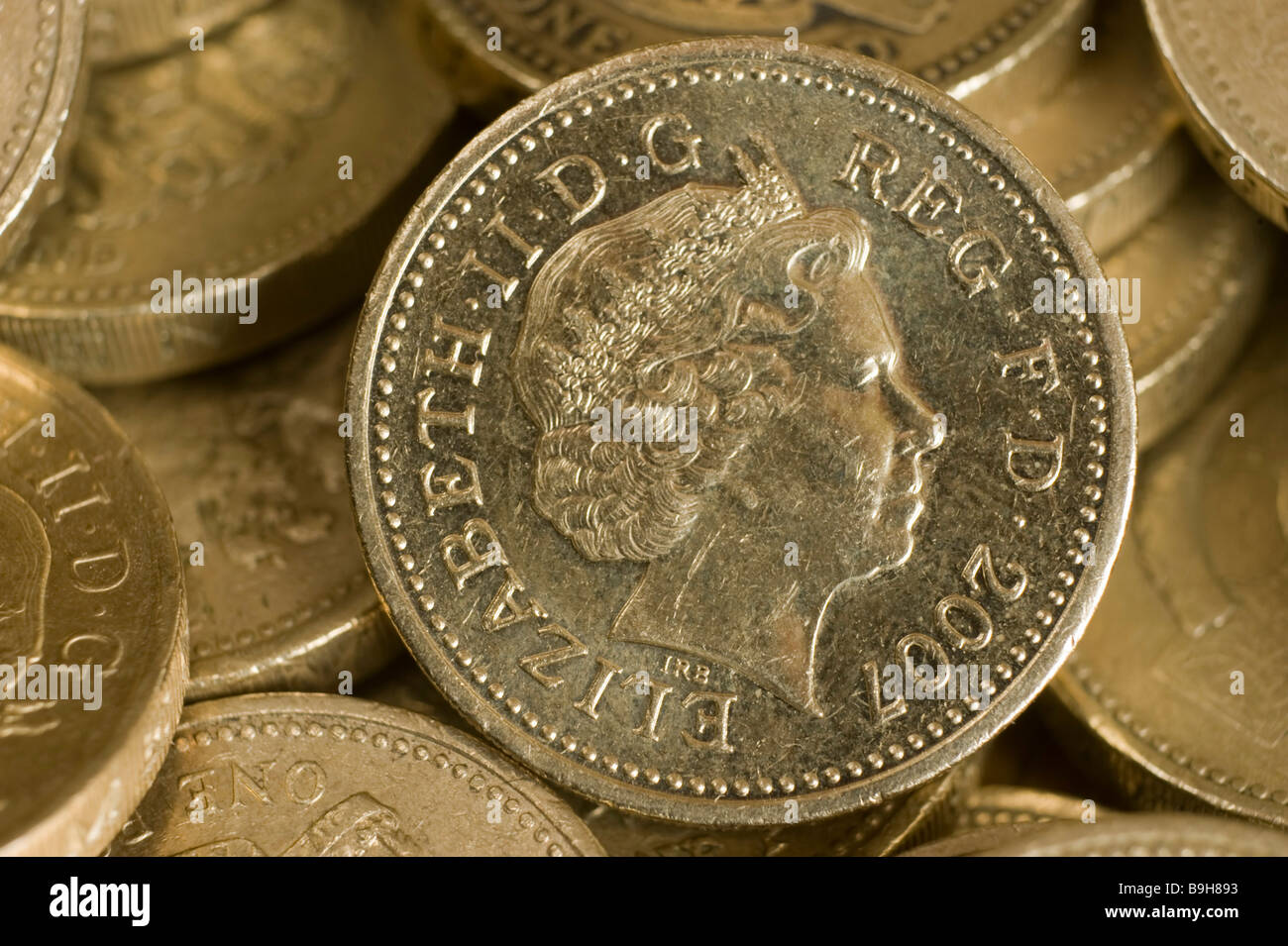 On Spec for stock One pond coins in piles Picture by Andrew Hasson ...