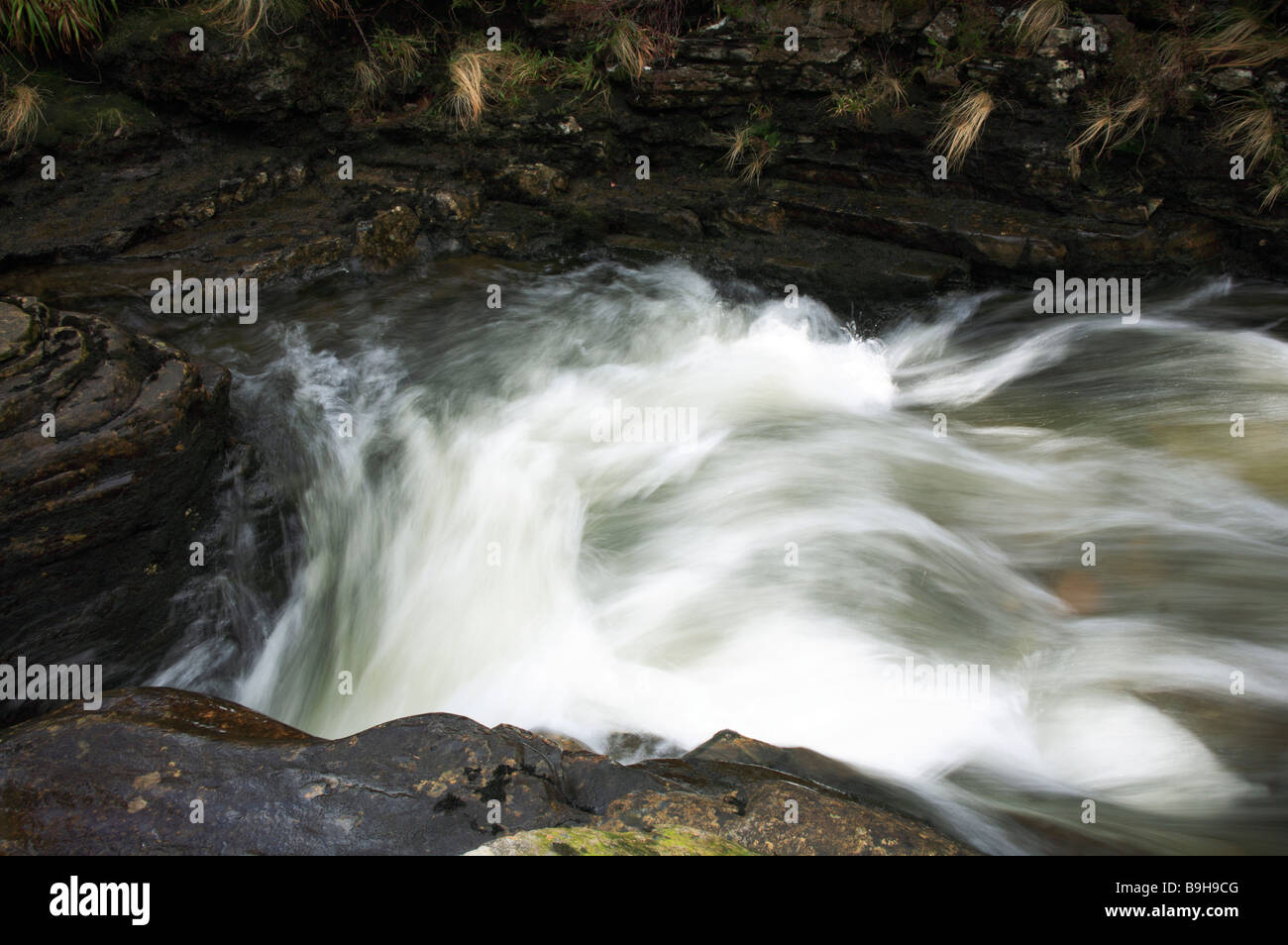 Head of waterfall showing Quoich Water entering narrow gorge at Linn of ...