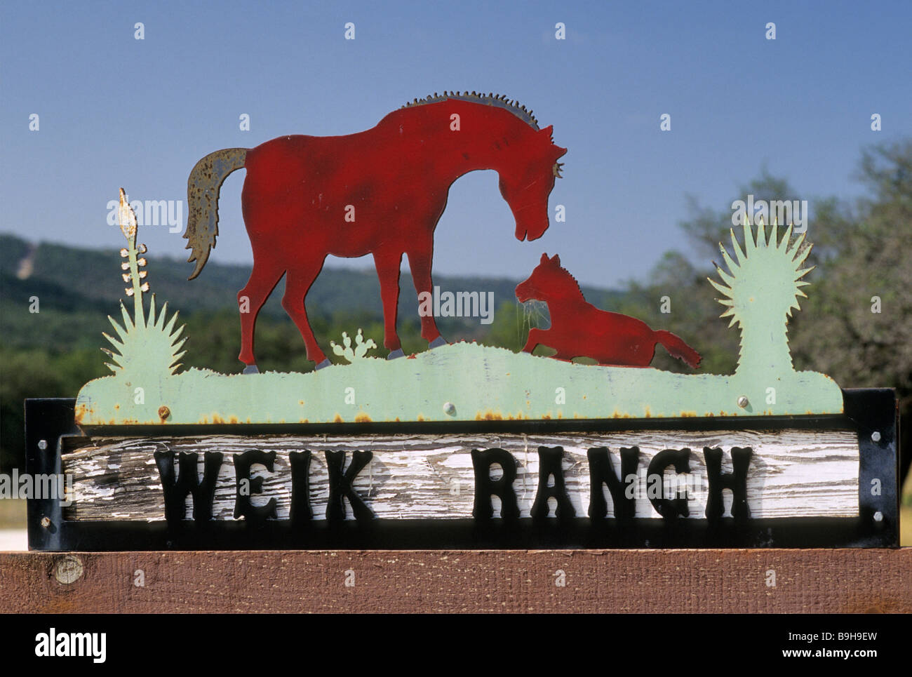 Wrought iron sign at ranch entrance on Kyle Ranch Road near Tarpley in ...