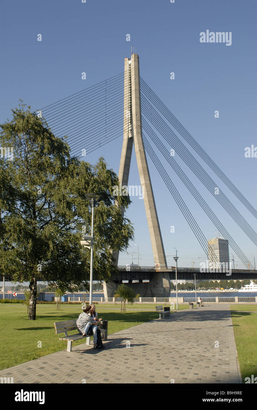 Latvia Riga river Daugava Vansu bridge promenade people Baltikum ...
