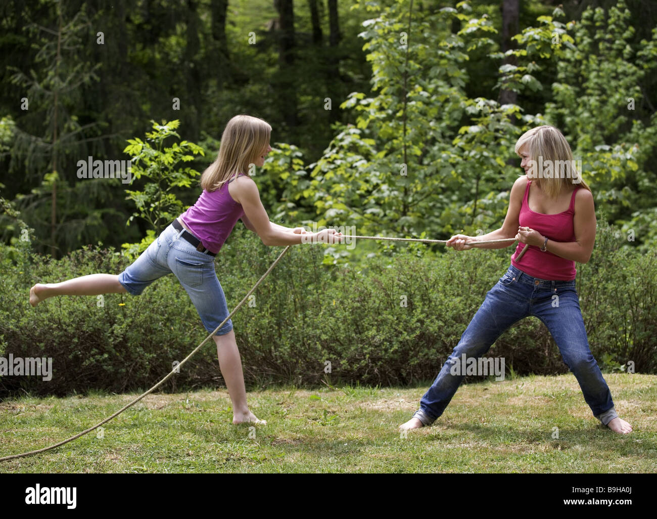 teenagers girl rope-traction Stock Photo - Alamy