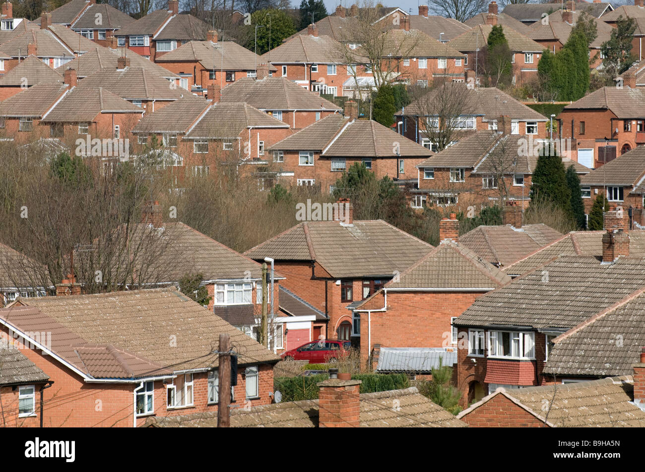 A view of suburban houses and rooftops in the West Midlands England UK ...