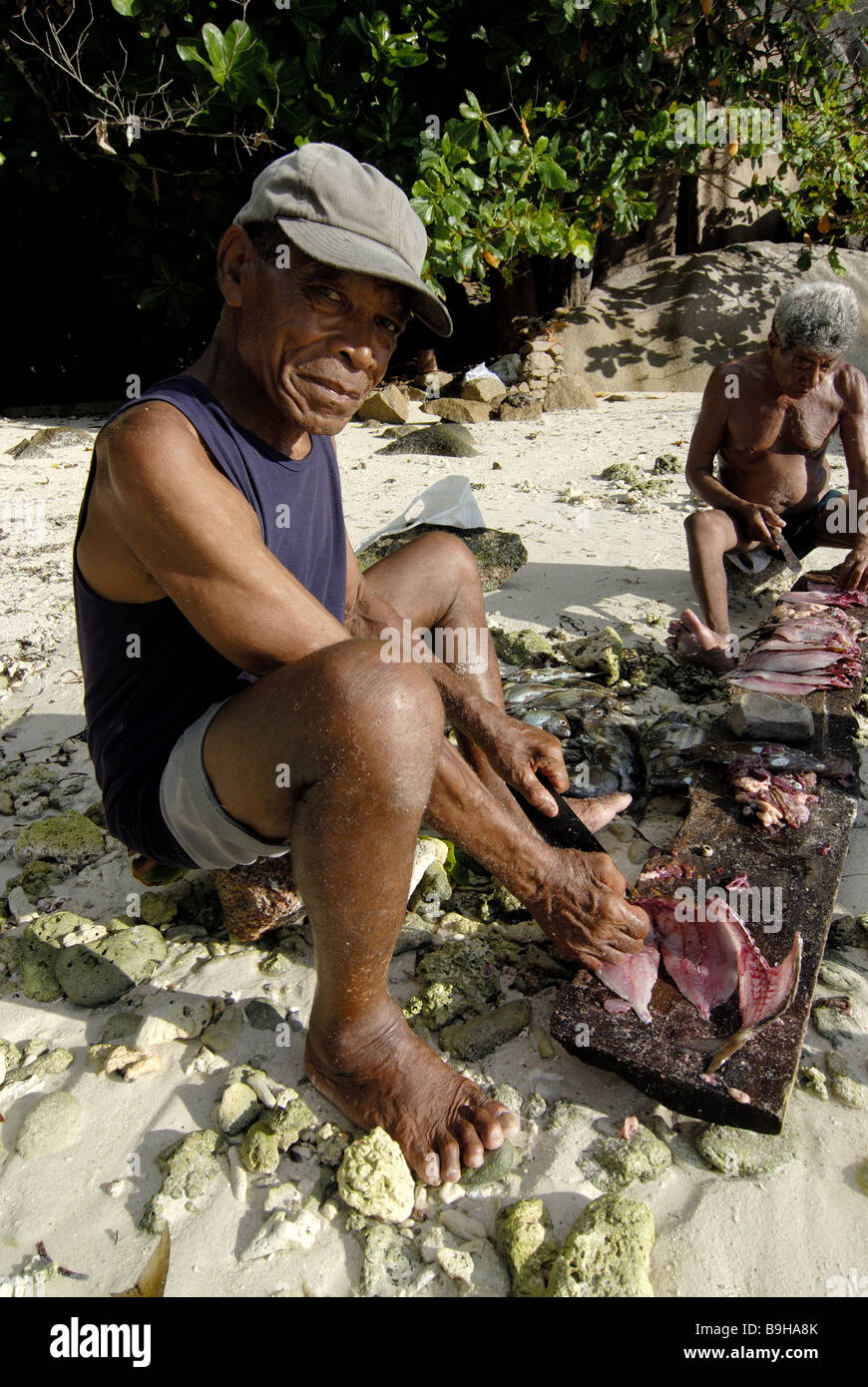 Seychelles La Digue splits Anse Source d' Argent beach fishers fish ...