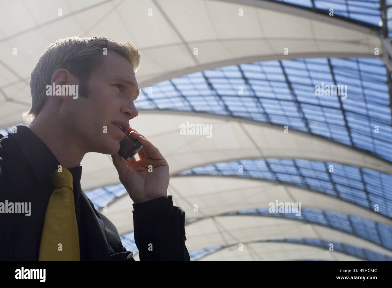 Telephone businessman cell phone buildings Stock Photo - Alamy