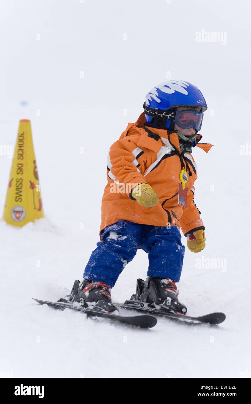 boy small skiing winter Stock Photo - Alamy