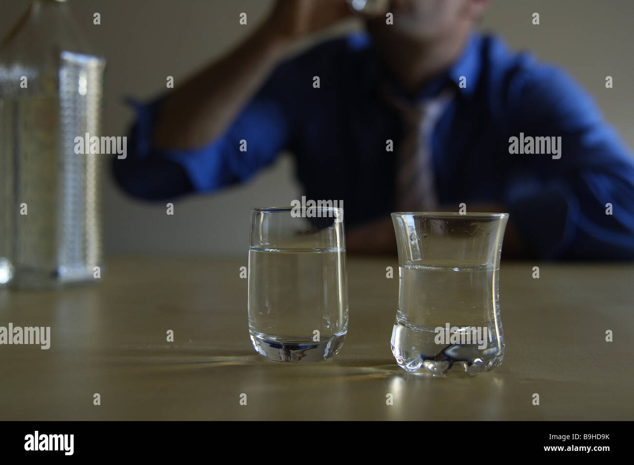 Man sitting schnapps drinks blur detail series people businessman ...