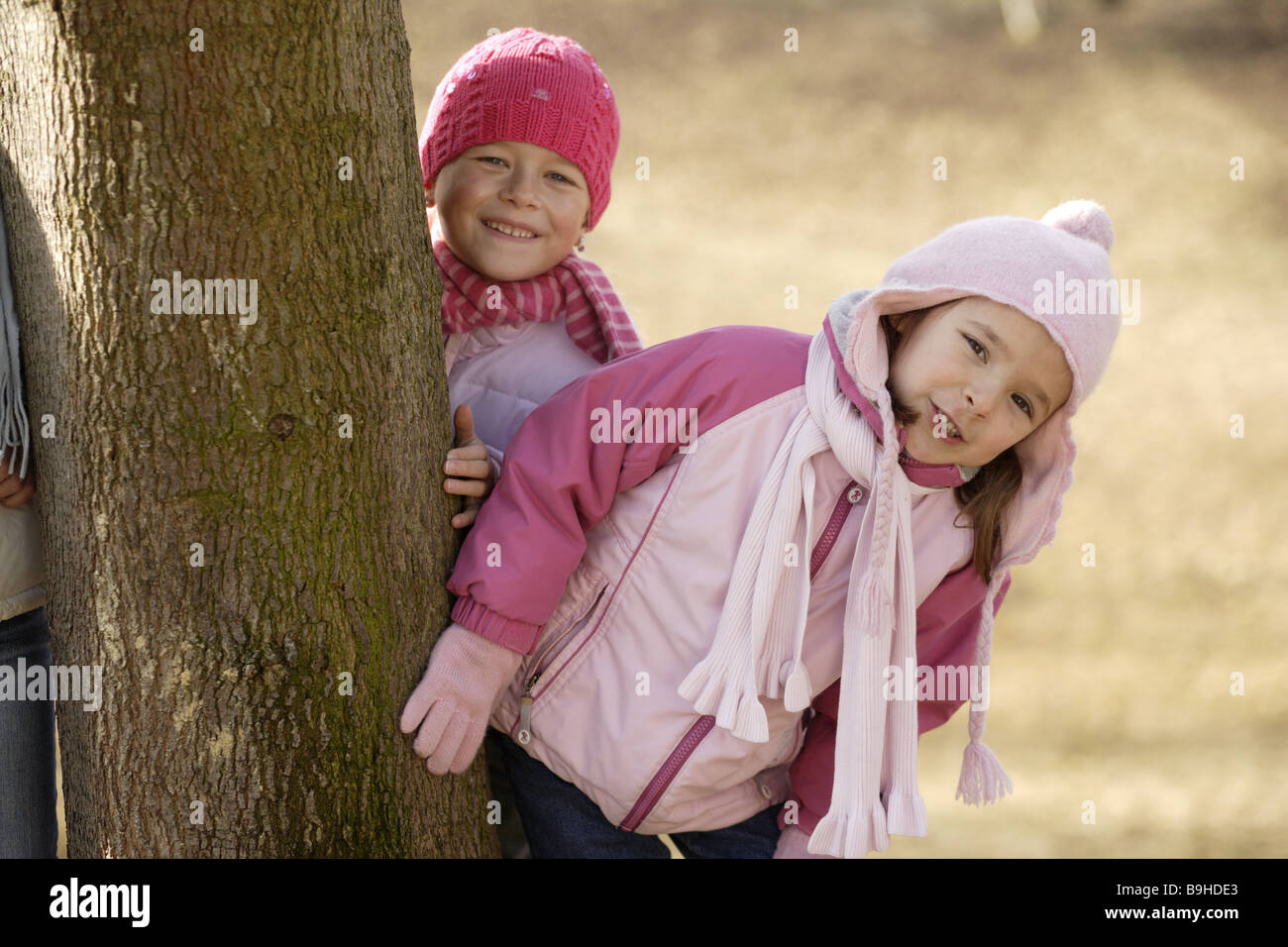 girl friends log portrait Stock Photo - Alamy
