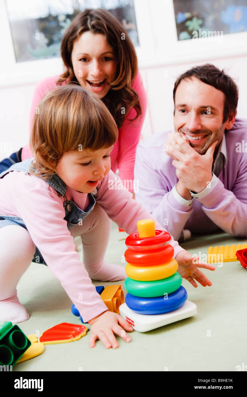 Family playing together Stock Photo - Alamy