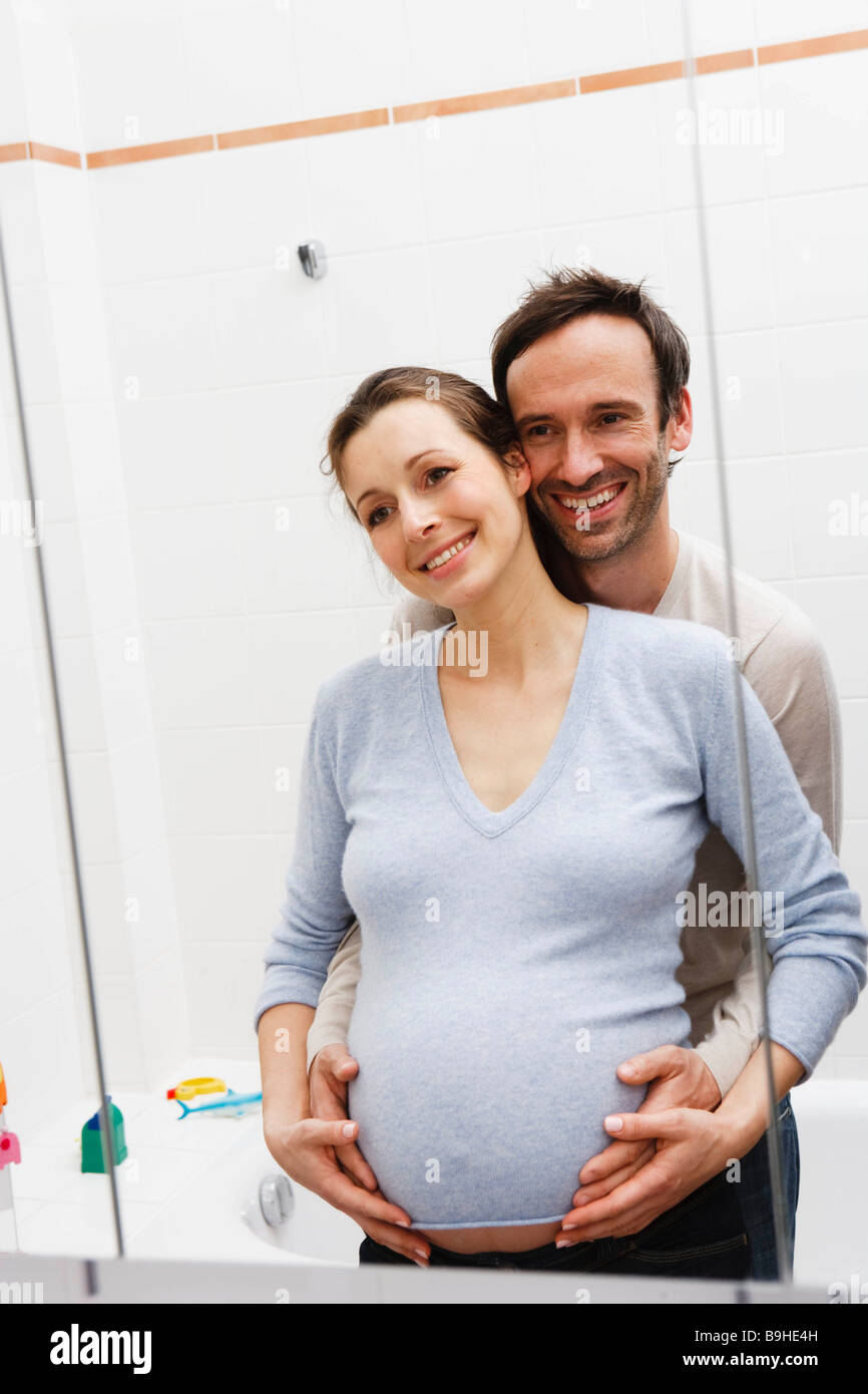 Pregnant woman in front mirror hi-res stock photography and images - Alamy