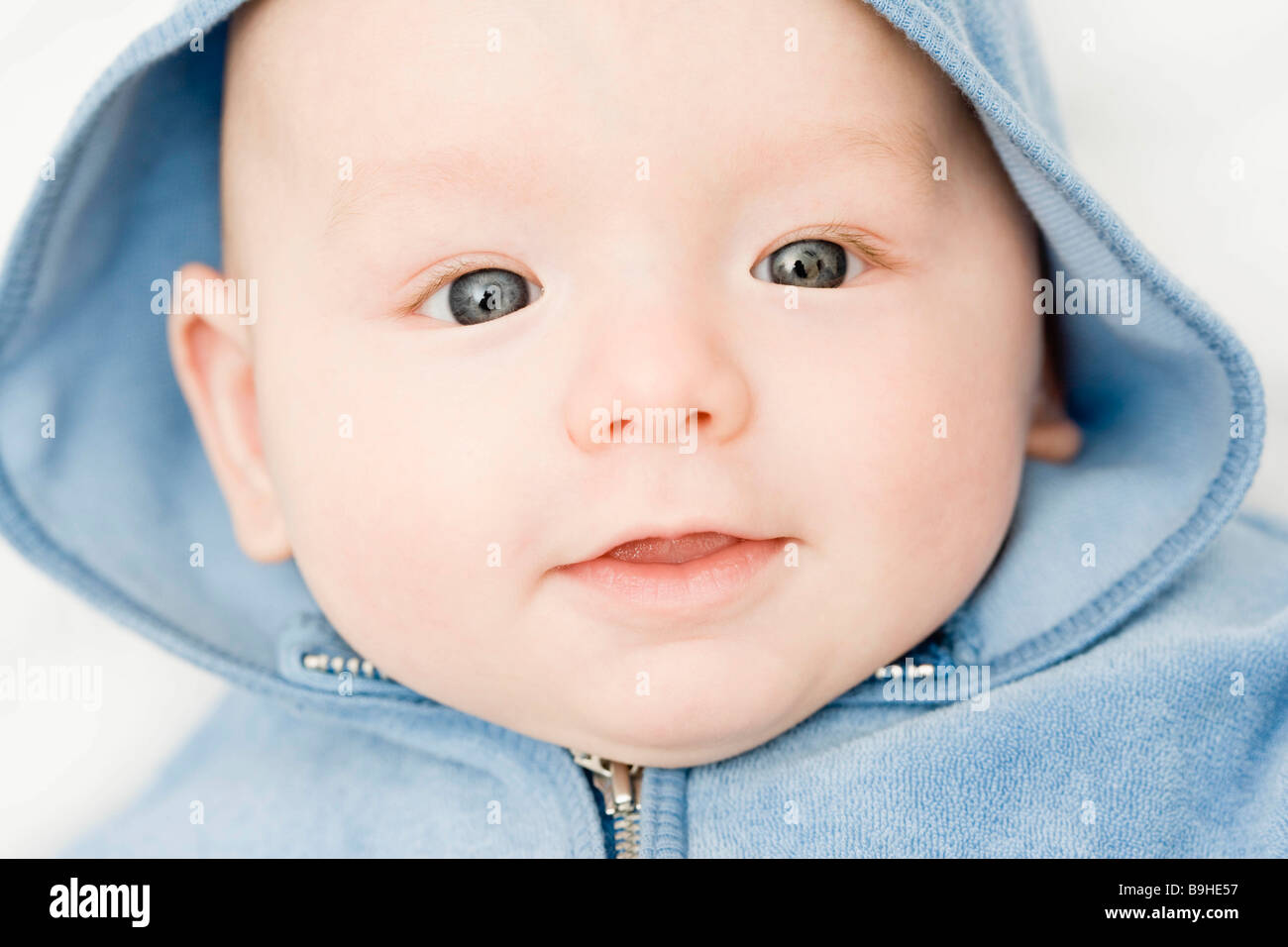 Baby smiling into camera Stock Photo - Alamy