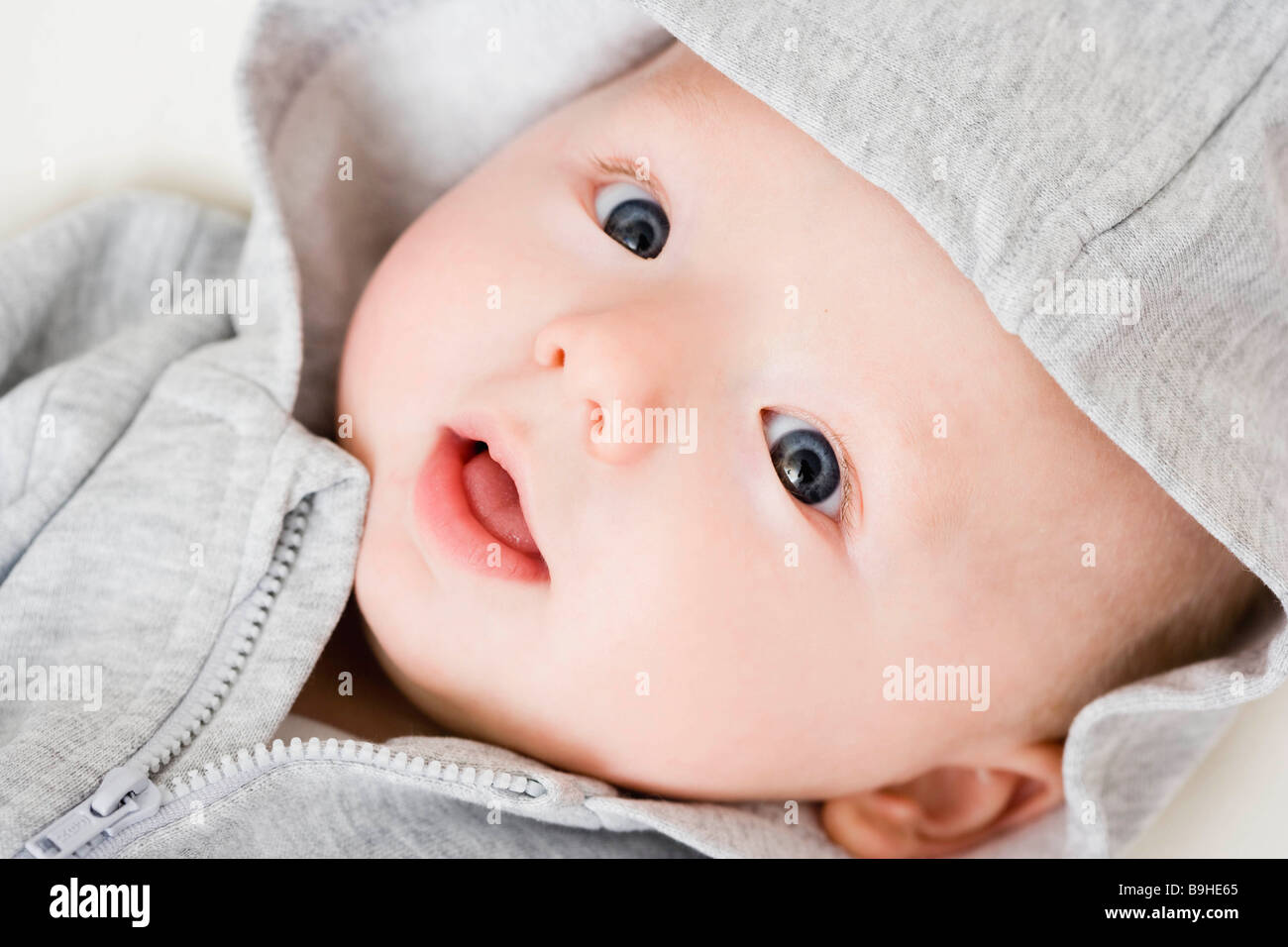Baby looking up Stock Photo - Alamy